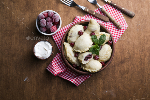 Pierogi with cherries. Vareniki dumplings. Traditional Ukrainian food ...