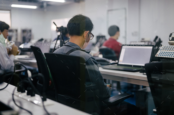 People studying and learning robot operating system at manufacturing ...