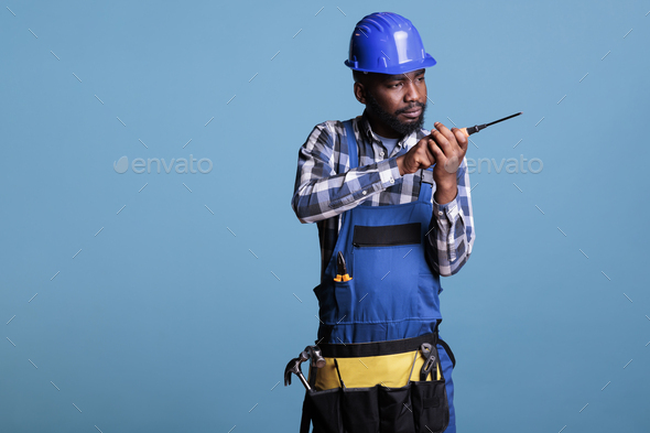 Construction worker using screwdriver Stock Photo by DC_Studio | PhotoDune