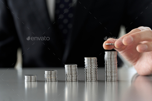 Business image of piling up money Stock Photo by cait00sith | PhotoDune