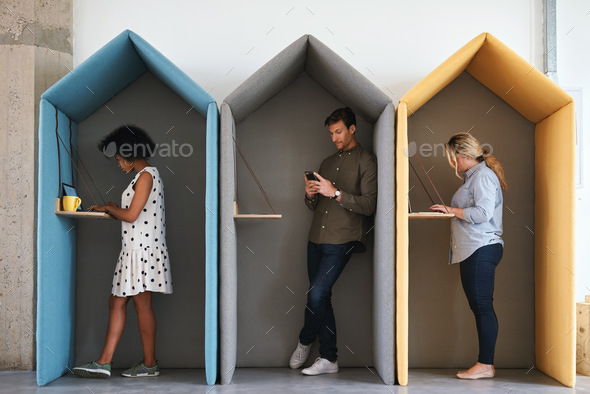 Business people working in colorful office cubicles in workplace Stock ...