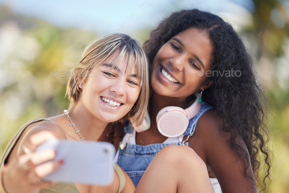 Smile, selfie and friends relax at a park for bonding, chilling and ...