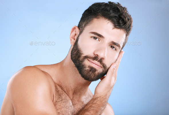 Skincare, cosmetic and portrait of a man feeling face isolated on a ...