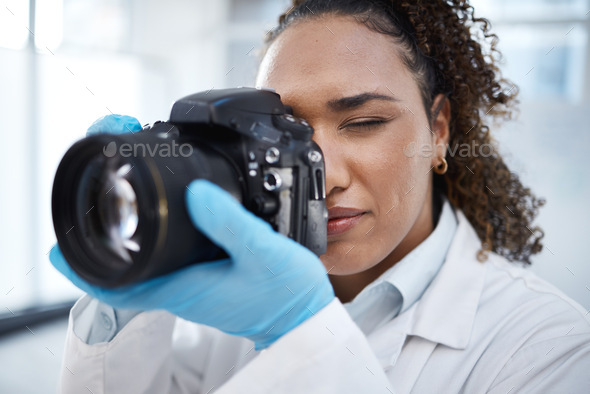 Camera, photography and medical with black woman in forensics ...