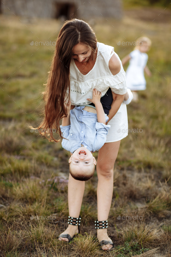 mom and son have fun together. Enjoying life together concept. Happy ...
