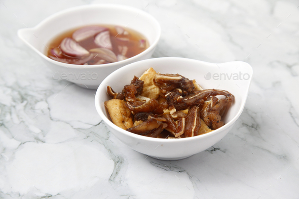 Freshly cooked Filipino food called Tokwa't Baboy Stock Photo by junpinzon