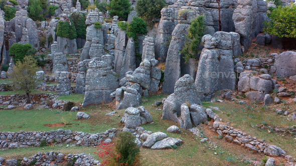 Beautiful nature landscape with rock formations and evergreen trees ...