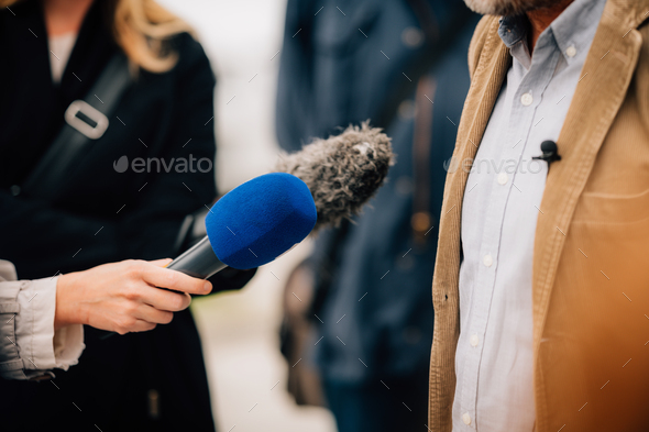 News reporters interviewing Stock Photo by microgen | PhotoDune