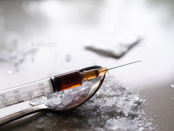 Methamphetamin Drug in Syringe on Spoon,Speed Drug Addiction Stock ...