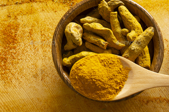 Turmeric sticks and powder. Alternative medicine Stock Photo by safakc1