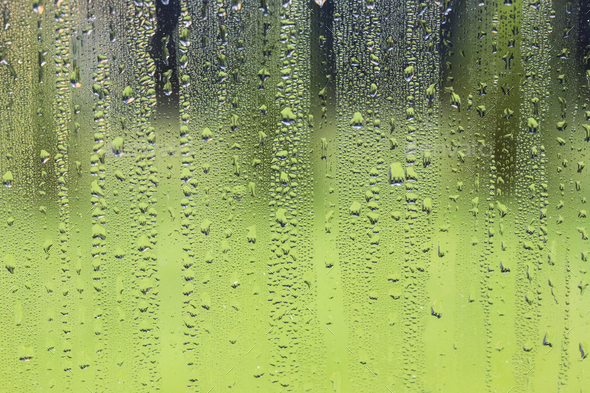 Steamy window with striped water drop pattern Stock Photo by wirestock