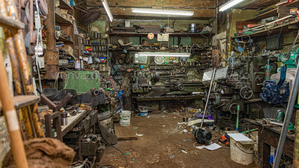 Shop of a machines engines repair master has the tools, machines and ...