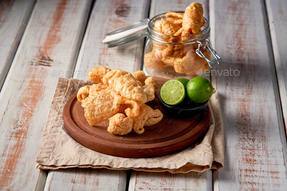 Pork Rinds also called chicharron or chicharrones and tortilla Stock ...