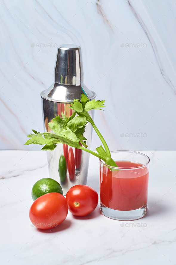 Bloody or virgin mary cocktail served in a cup with celery sticks Stock ...