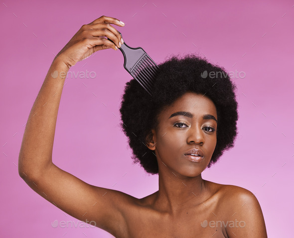 Portrait, hairstyle or afro brush on beauty studio background in relax ...