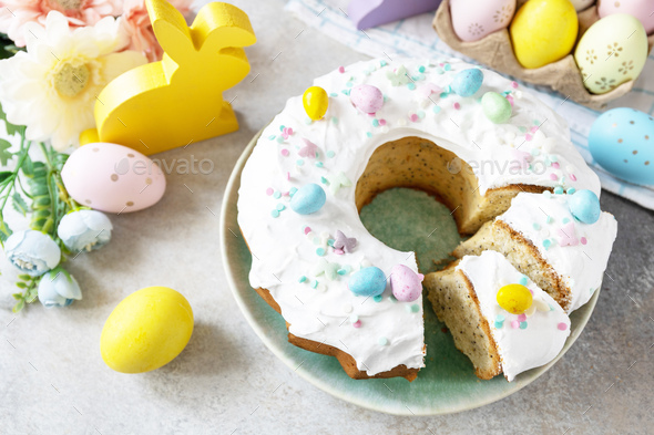 Glazed easter lemon cake decorated with confectionery and mini ...