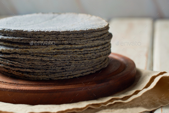 Traditional mexican blue corn tortilla Stock Photo by FabianMontano