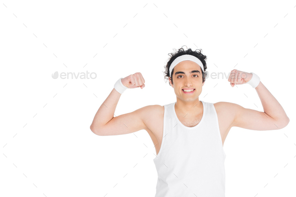 Young thin man in singlet showing muscles isolated on white Stock Photo ...