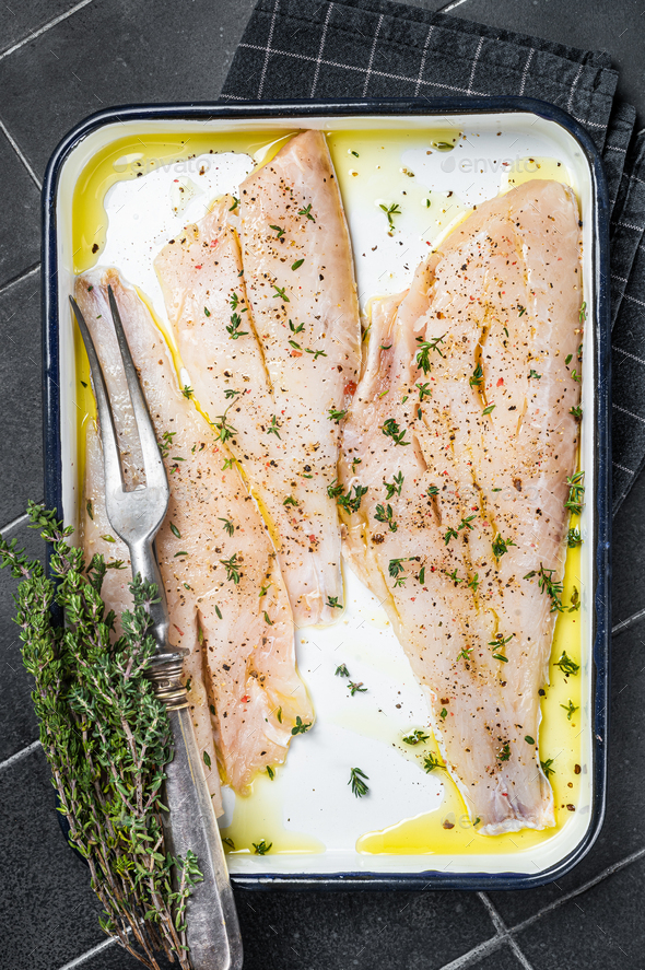 Marinated ocean red perch fillet with olive oil, thyme and spices ...
