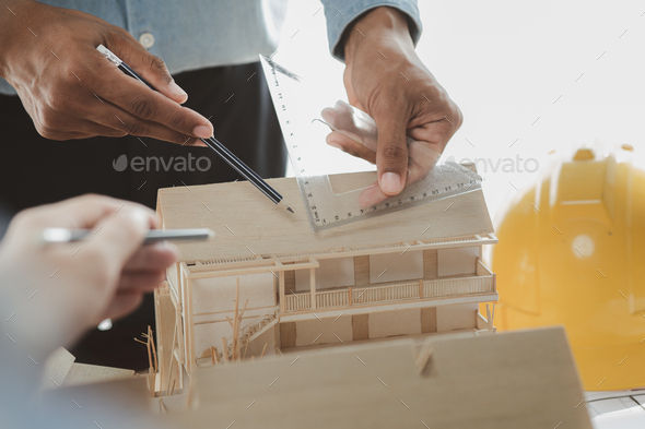 Architects and engineers are working together to edit the draft ...