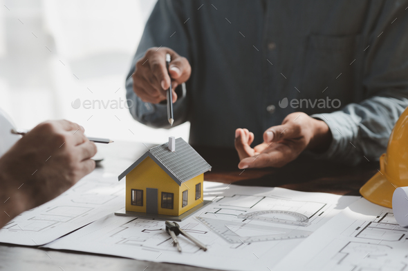 Architects and engineers are working together to edit the draft ...