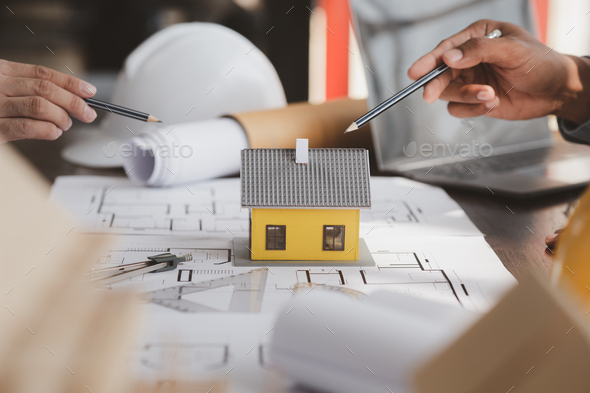 Architects and engineers are working together to edit the draft ...