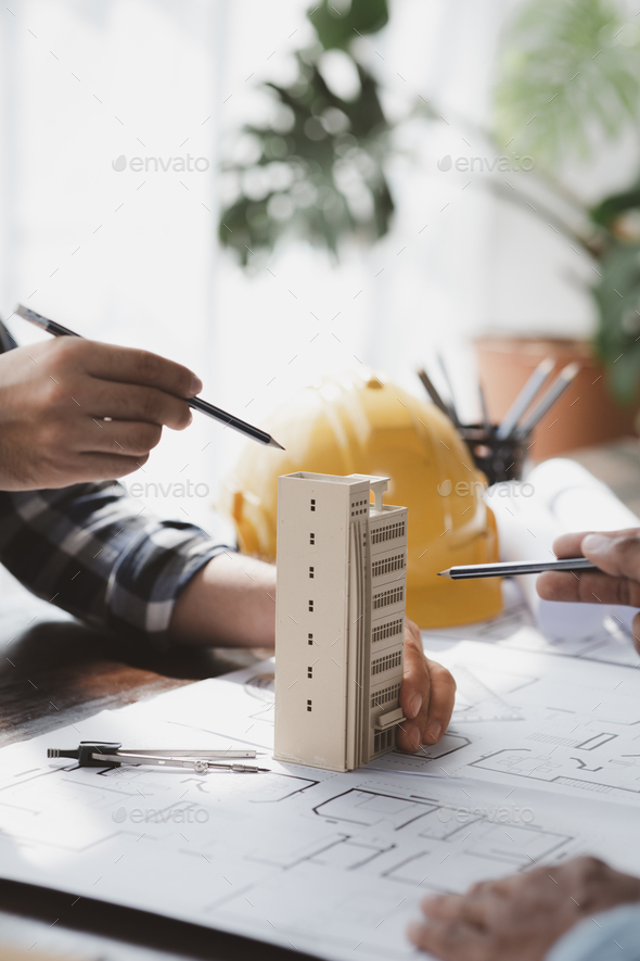 Architects and engineers are working together to edit the draft ...