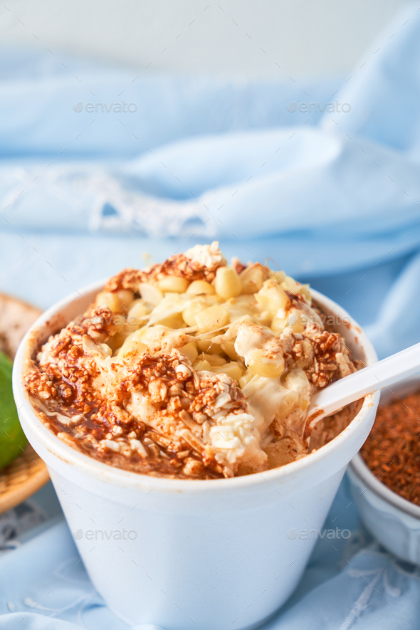 Mexican snack, prepared esquite, corn in a cup, with chili Stock Photo ...