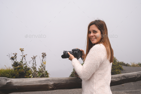 Shallow focus shot of a young beautiful Latina with a professional ...