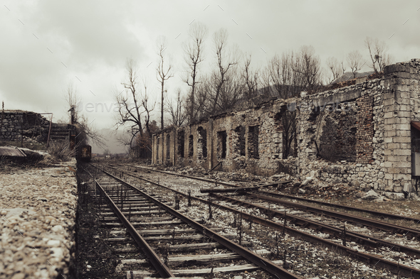 A view of an abandoned railroad station on a disused railroad Stock ...