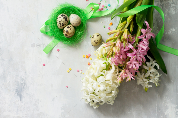 Easter concept. Bouquet of spring hyacinth flower and easter decor on ...