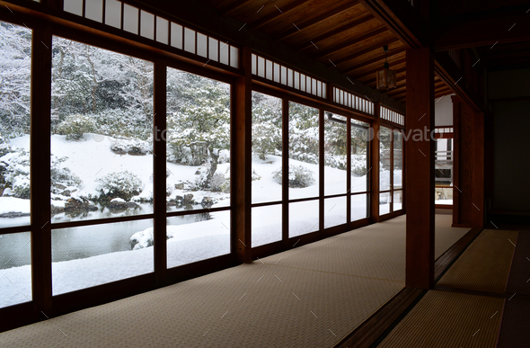 Japanese winter garden viewed from inside traditional room with ...