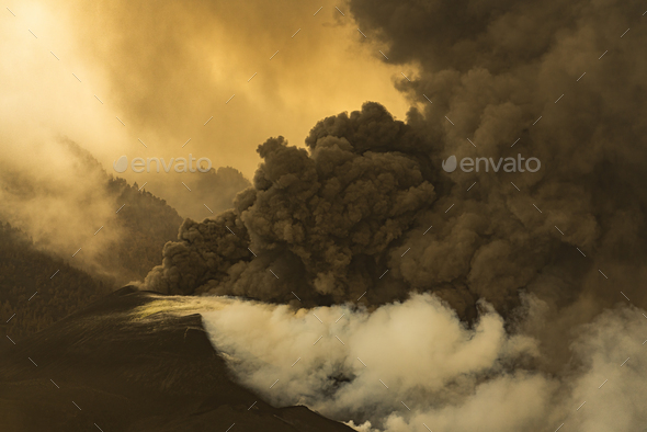 Cloud of heavy smoke caused by the eruption Stock Photo by wirestock