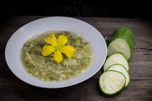 Plate of fried luffa with onion and garlic. Asian kitchen Stock Photo ...