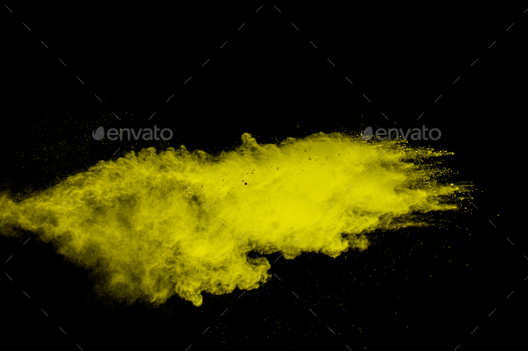 Yellow powder explosion on white background. Freeze motion of yellow ...