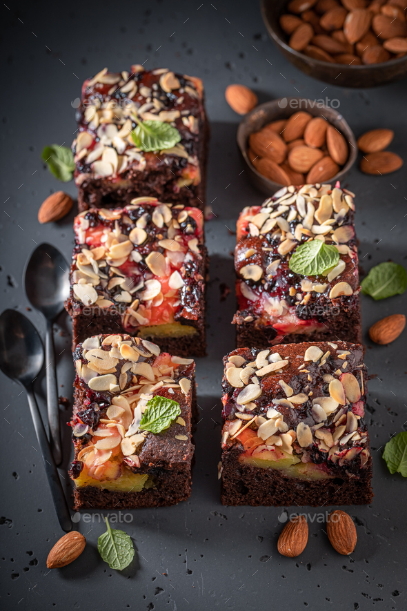Tasty and sweet brownie made of fruits and almond. Stock Photo by Shaiith