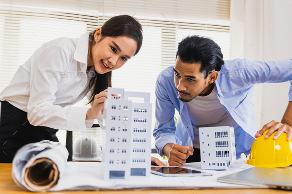 Architect team in office, engineer designers working in Office check ...