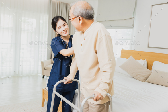 Elderly patient physiotherapy nurse exercising and try to walk Stock ...