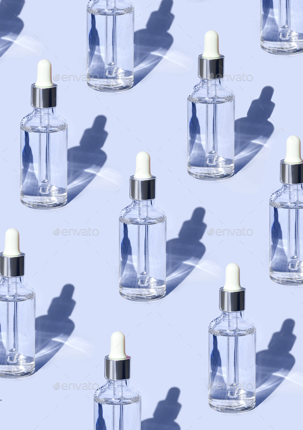 pattern serum on a blue background with natural light Stock Photo by ...