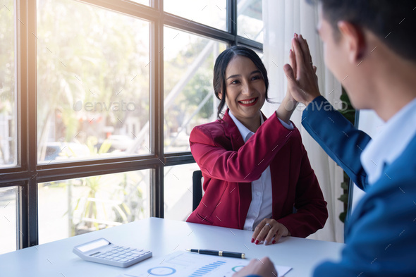 Happy smiling businessman feel happy work complete Teamwork success at ...