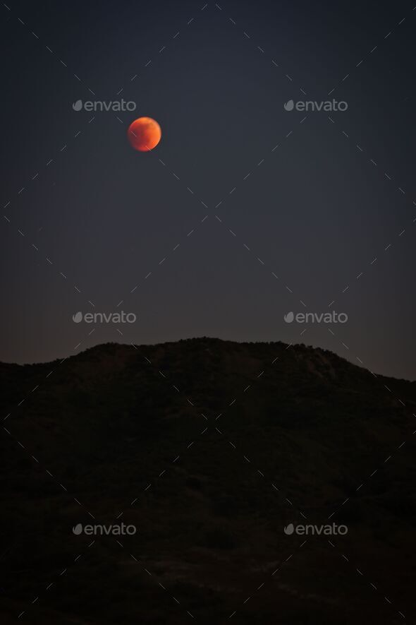 Mysterious view of a night sky with red moon in Los Angeles, California ...
