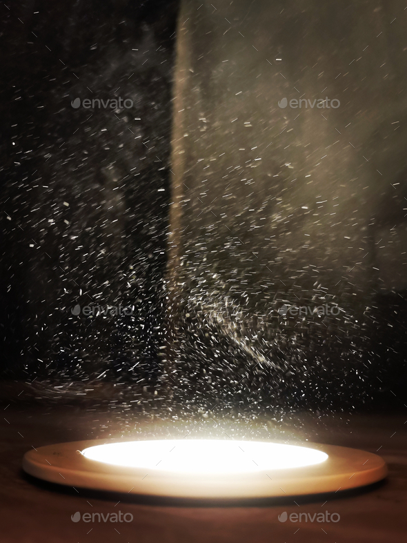 Vertical shot of moving dust particles in a light ray Stock Photo by ...