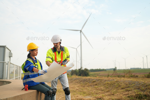 Wind turbine maintenance engineer at wind farm construction site. Wind ...