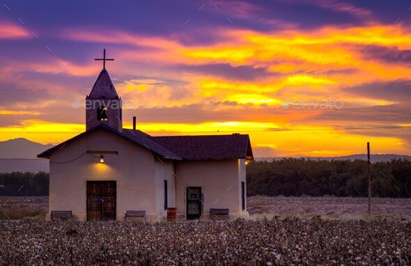 Mesmerizing shot of a church in the countryside during the orange ...