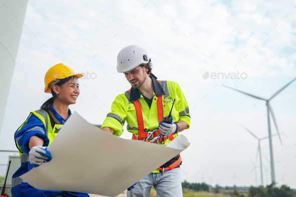 Wind turbine maintenance engineer at wind farm construction site. Wind ...