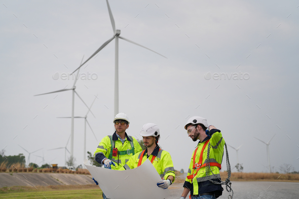 Wind turbine maintenance engineer at wind farm construction site. Wind ...