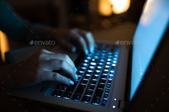 Businessman Typing Recent Updates On Lap Top Keyboard On Desk ...