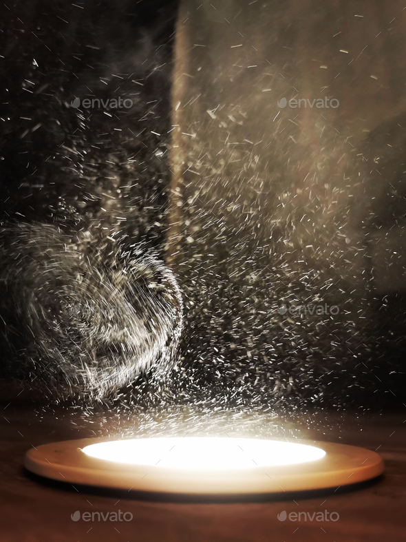 Vertical shot of moving dust particles in a light ray - Stock Image ...