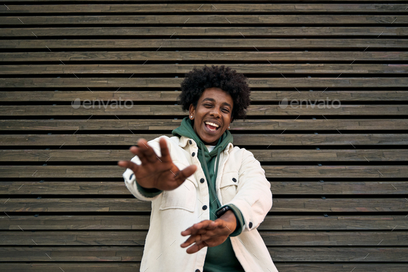 Happy funny gen z hipster rapper African American guy dancing and ...