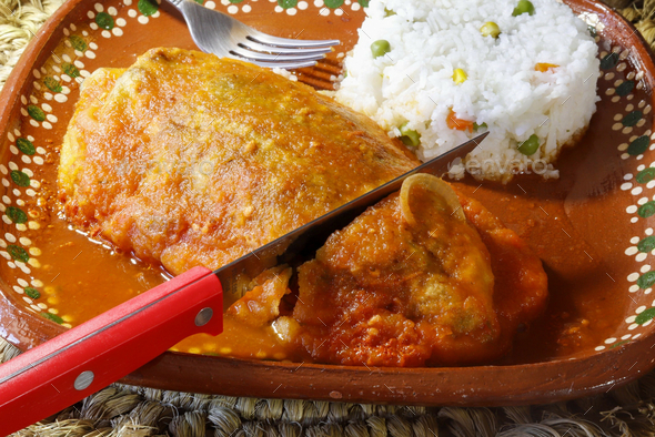 Mexican dish chile relleno with picadillo, tomato sauce, ground meat ...
